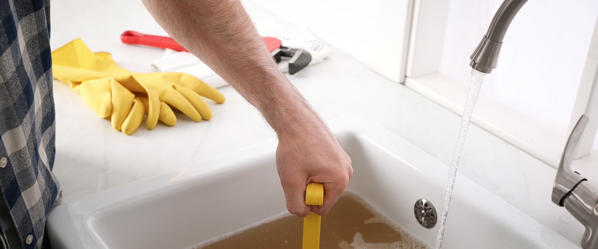 How to Prevent and Fix Clogged Drains Without a Professional Plumber